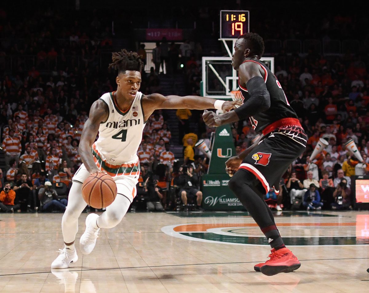 Lonnie Walker’s 25 points leads Hurricanes to overtime victory over ...